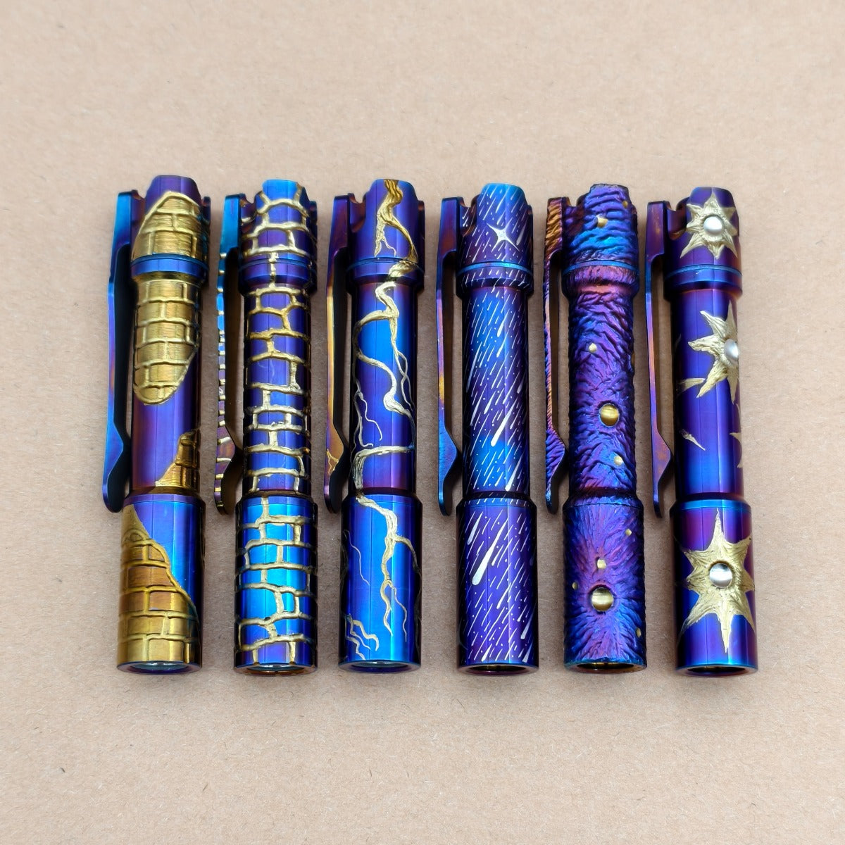 Pineapple mini Ti MK3- hand carved n heat anodized – ReyLight